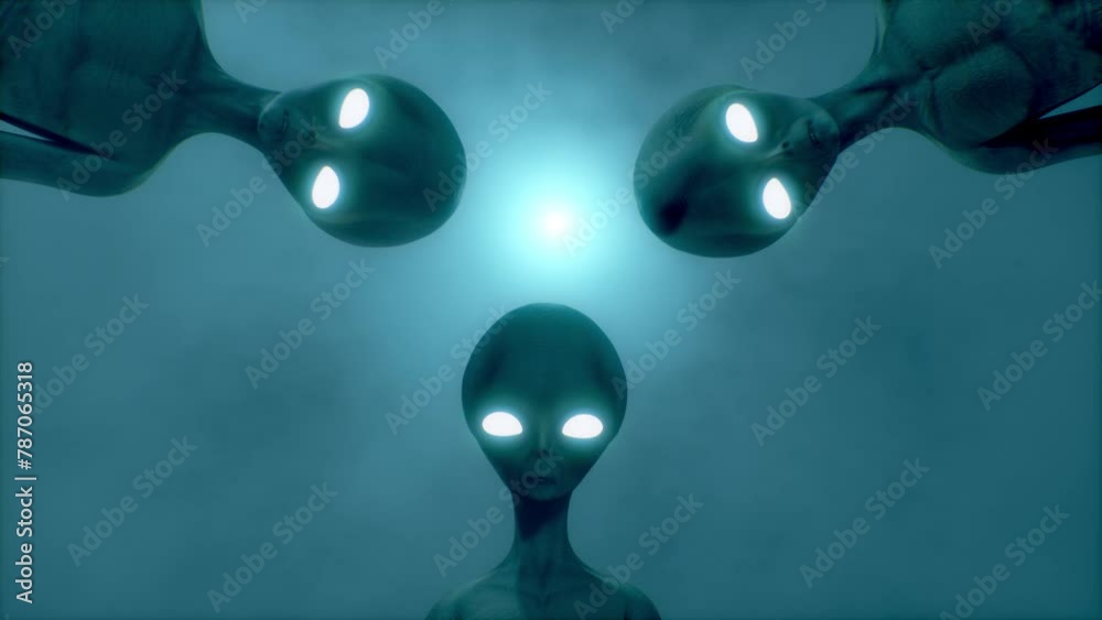 Three scary gray aliens looking down at you and blinking against the ...