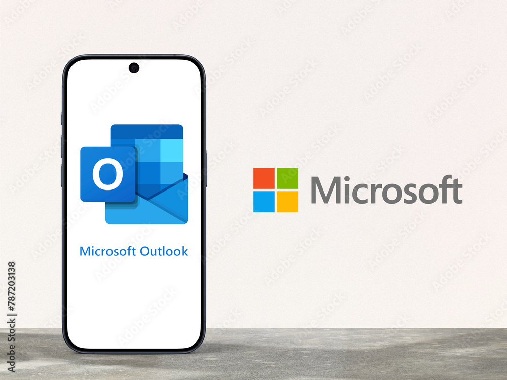 Outlook Logo is displayed on a modern smartphone, Microsoft logo next ...