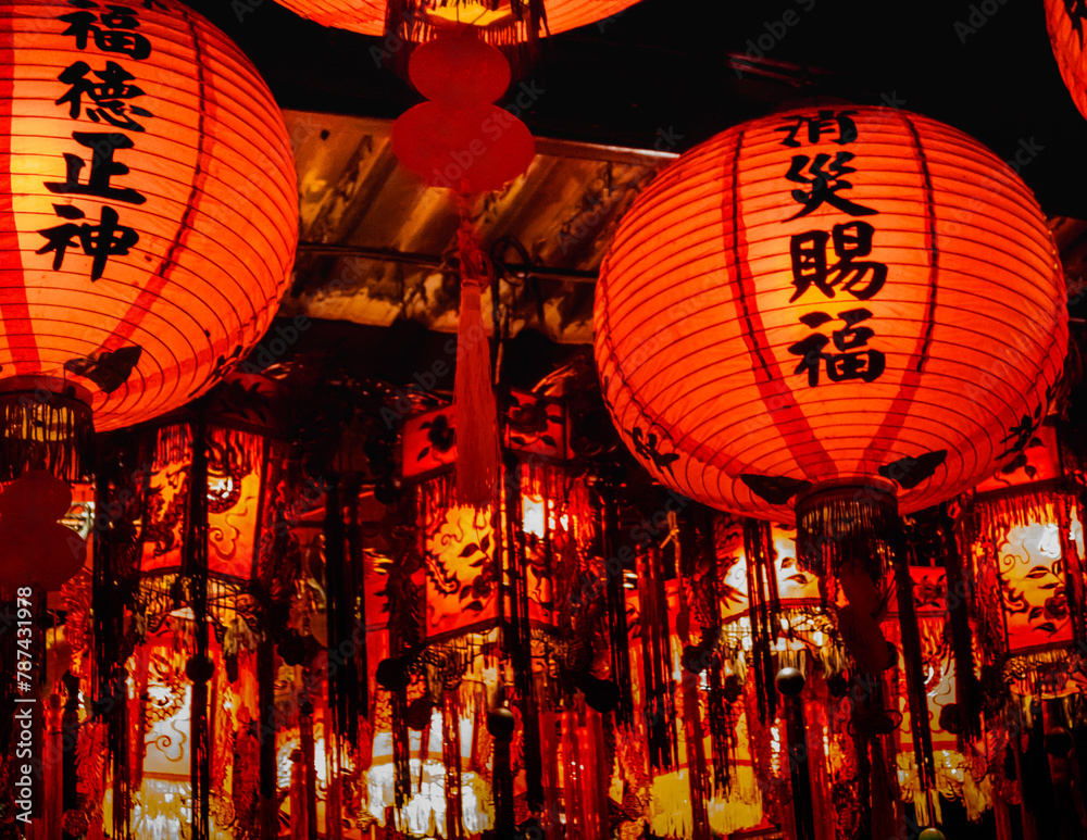 Array of pendant lanterns and palace lamps are installed on a local ...