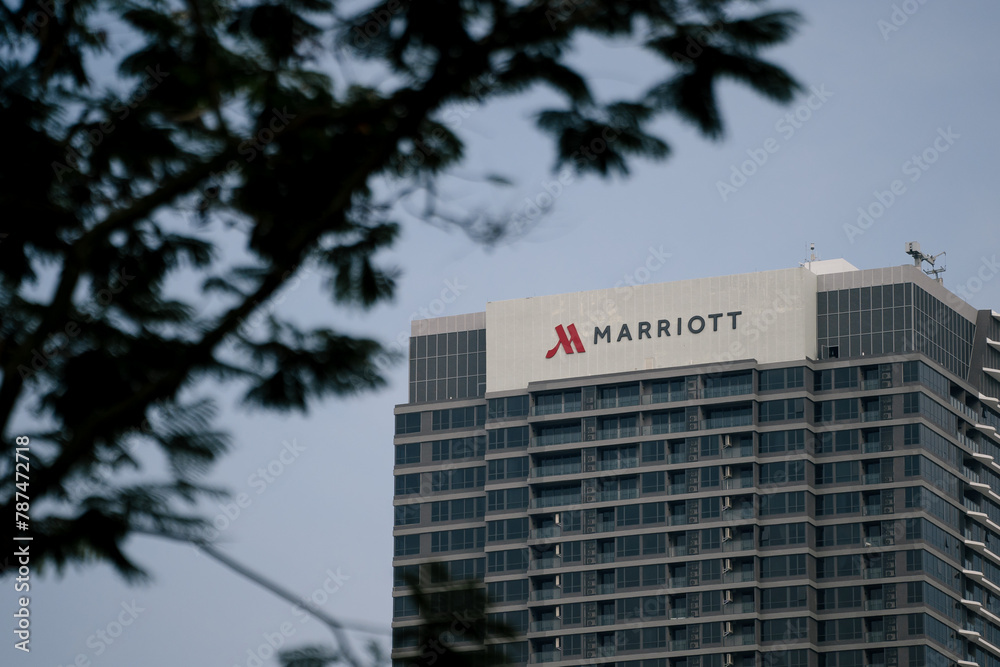 PENANG, MALAYSIA - FEB 04, 2024: The Marriott logo sits atop a building ...
