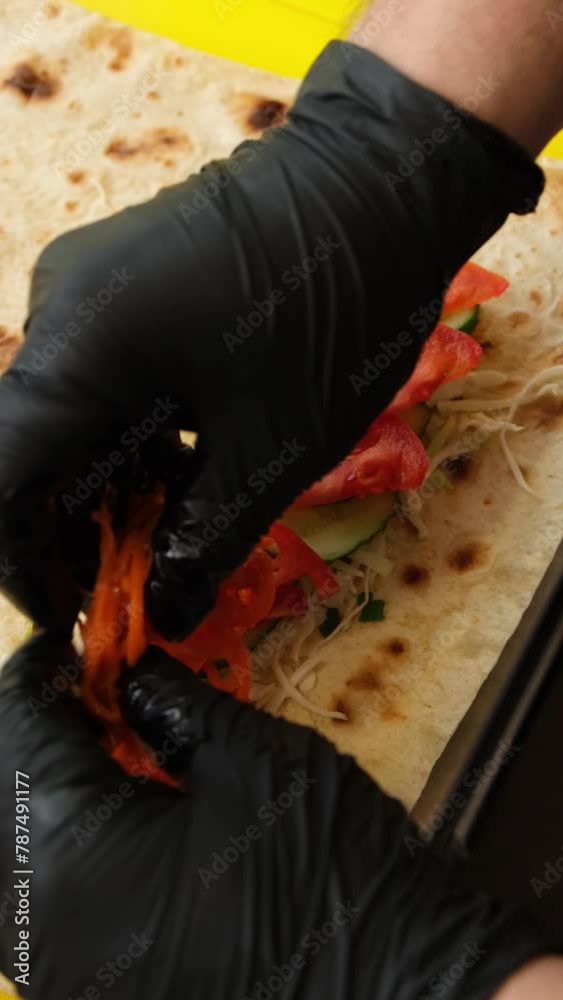 cooking shawarma, doner kebab. Delicious fat junk foods served in take ...