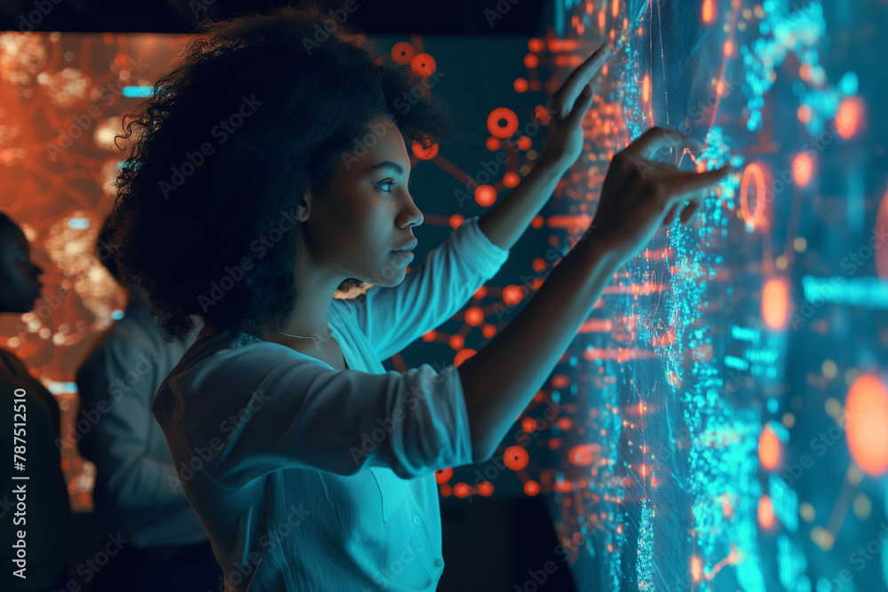 Positioned at a high-tech board, the woman points to a dynamic bubble ...