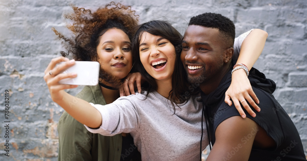 Diversity, selfie and social media with friends on brick wall ...
