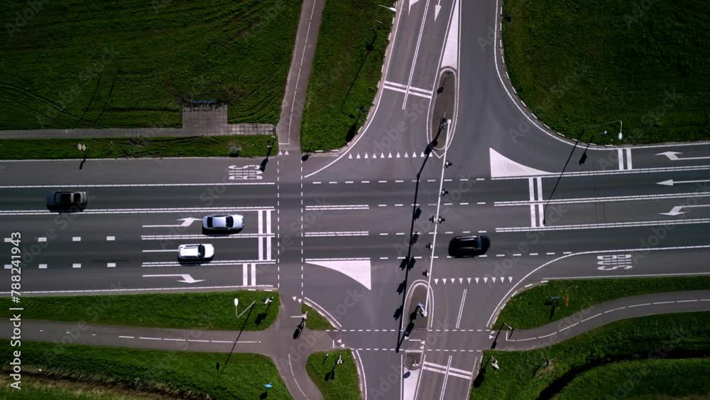 car traffic. Top view of a road with moving cars at an intersection ...