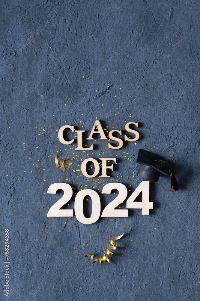 Class of 2024 concept wooden number 2024 with graduated cap and ...