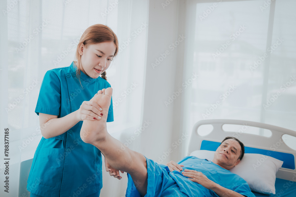 Foto de Asian female physiotherapist helping senior older woman ...