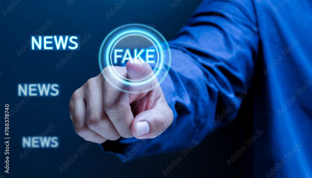 Hand pushing a fake button on a touch screen interface. Fake news ...