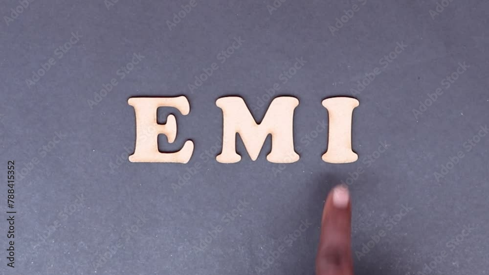 Bank and Financial Concept 'EMI' Spelling in Wooden Alphabet Letters on ...