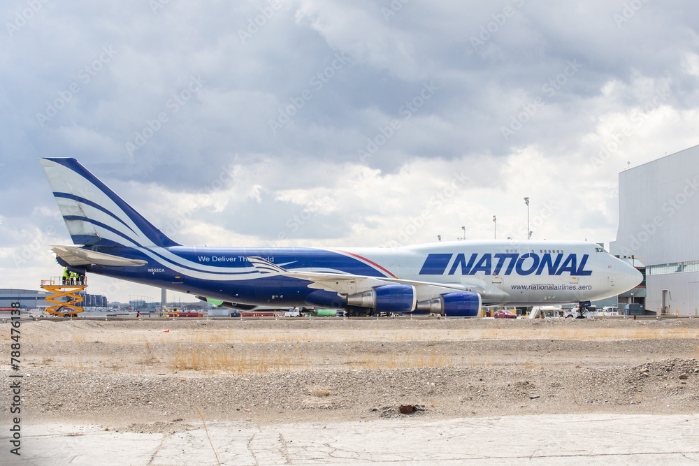 Toronto, Canada, April 7, 2023; A full side view of a National Airlines ...