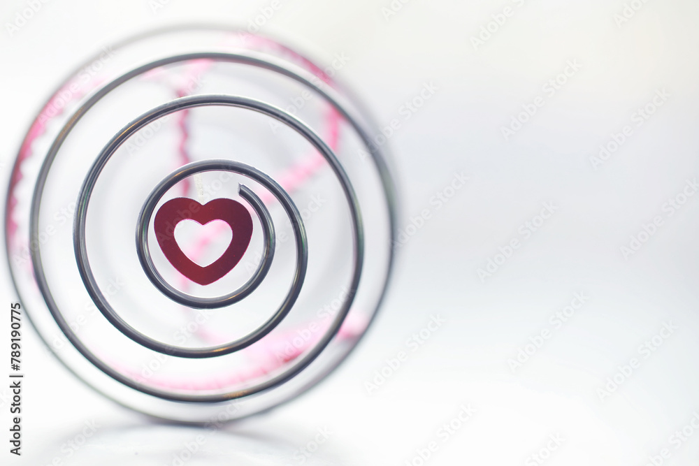 Metal spiral. The concept of endless turns. Golden ratio. The concept ...