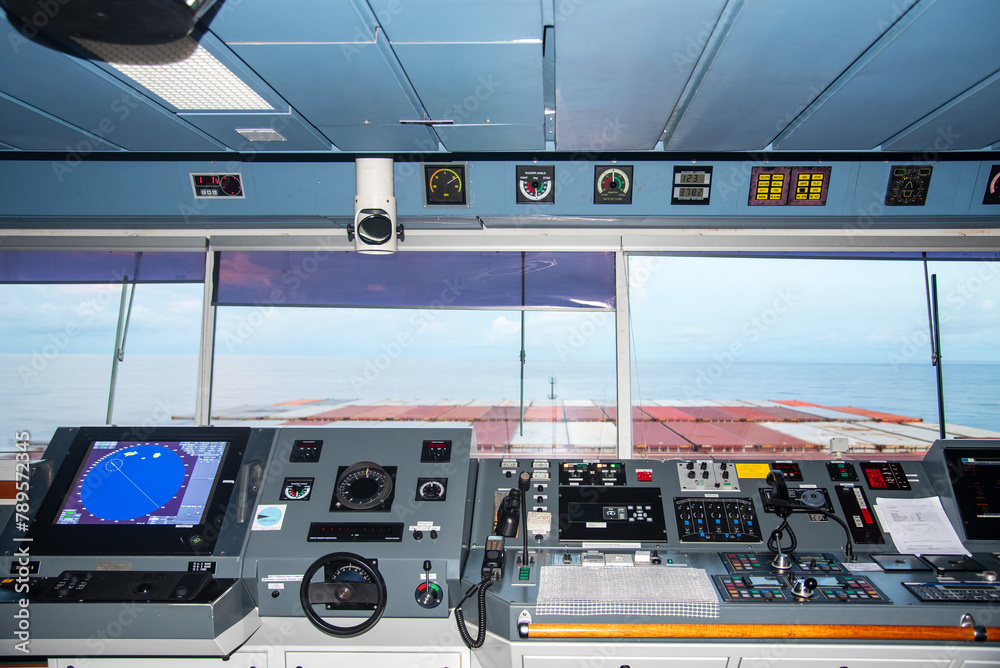 View of the control console on the navigational bridge of the cargo ...