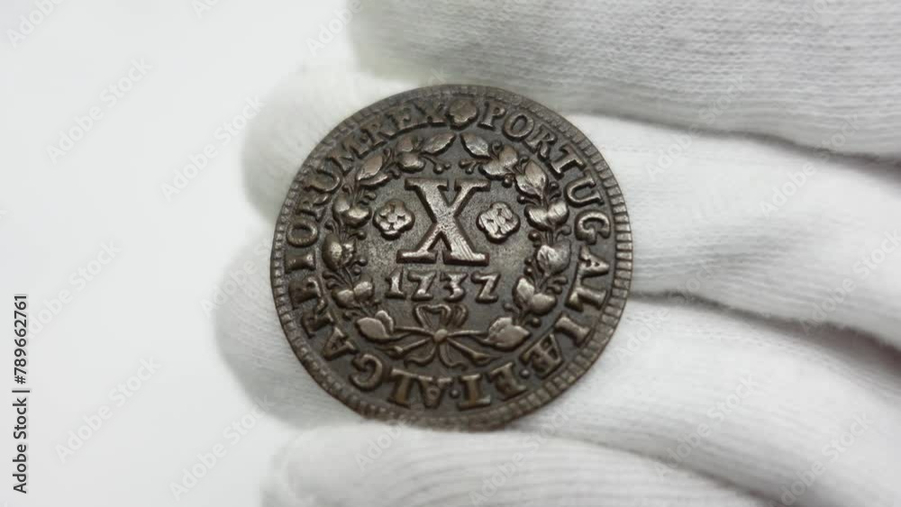 Portuguese copper coin of King João V. Obverse and reverse of the X ...