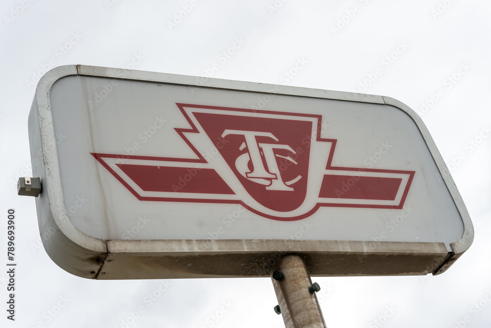 TTC logo sign on a cloudy sky located at Runnymede Road and Dundas ...