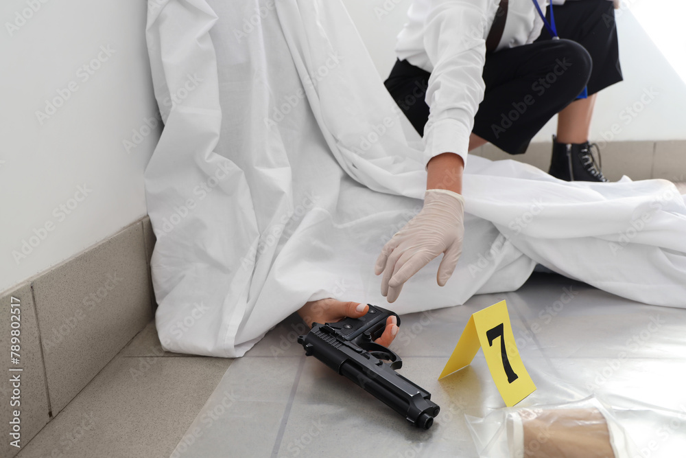FBI agents working at crime scene with dead body, closeup Stock Photo ...