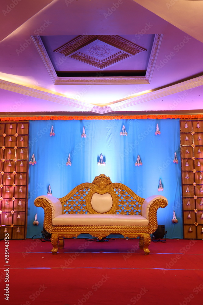 Indian style stage decoration with blue backdrop decorated with lotus ...