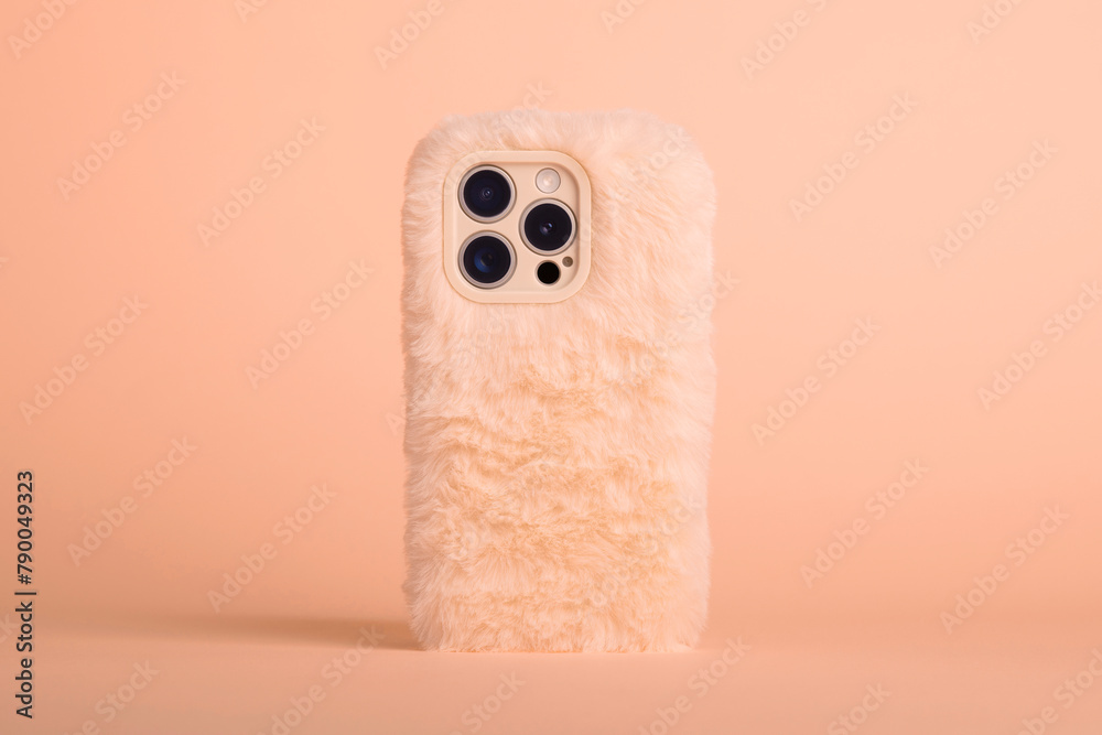 smartphone in peach fuzz fluffy fur case back view, phone case mockup ...