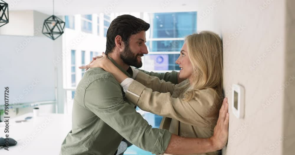 Attractive European couple colleagues hugging, talking, flirting ...