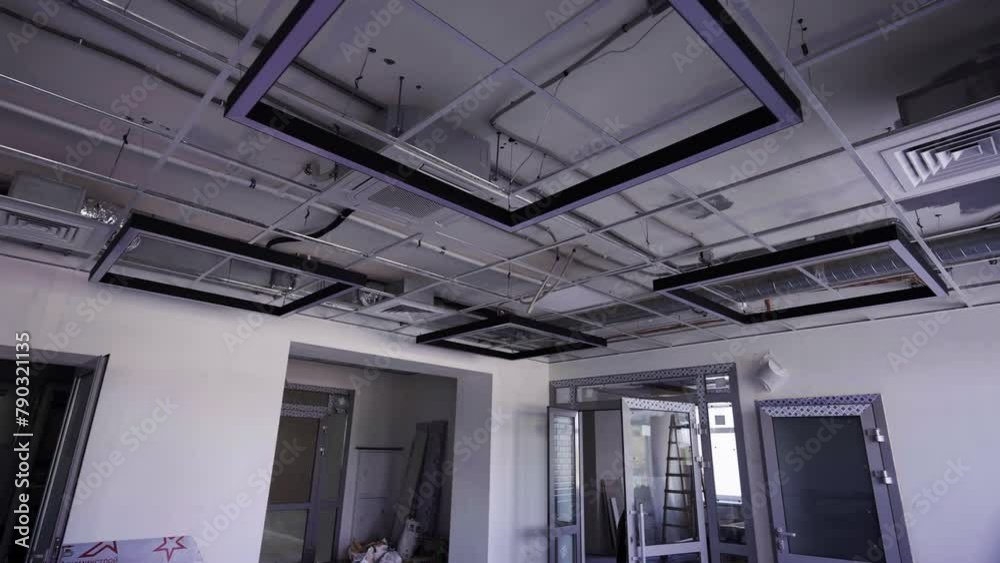 Ceiling equipped with metal frame for installing ventilation panels ...