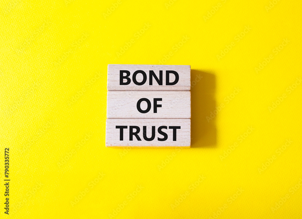 Bond of trust symbol. Wooden blocks with words Bond of trust. Beautiful ...