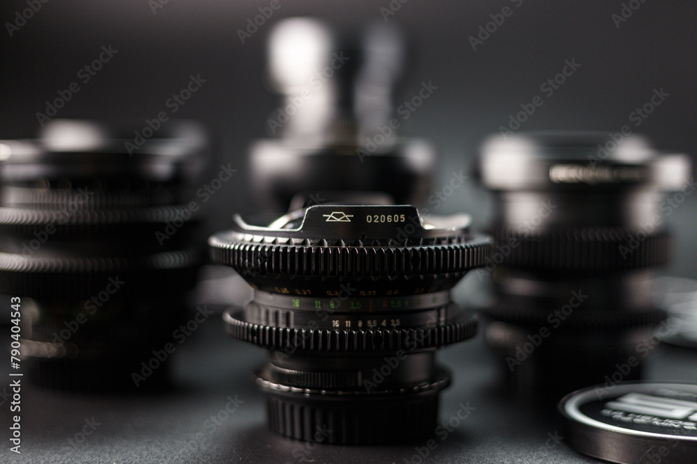 Vintage lens collection in soft focus, one lens with clear serial ...