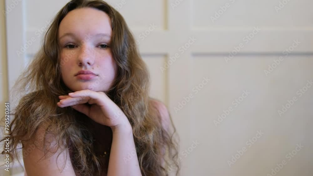 behind scenes female model sitting in front of big fan preparing photo ...