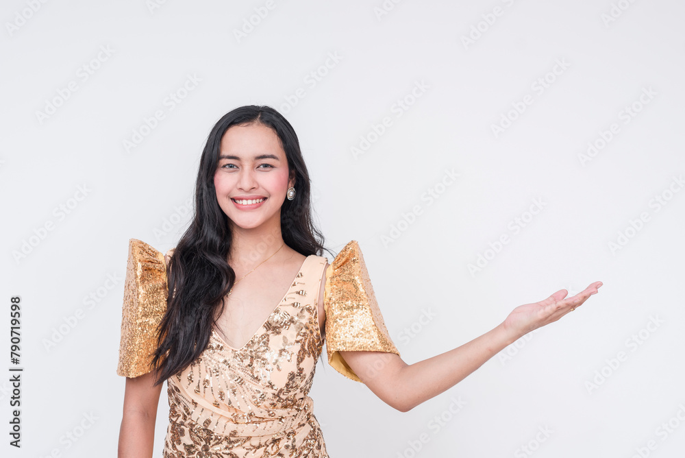 Elegant Filipino woman in traditional Filipiniana dress, presenting on ...