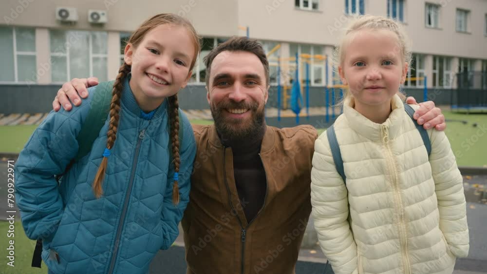 Happy family man two girls dad daughters schoolgirls students primary ...