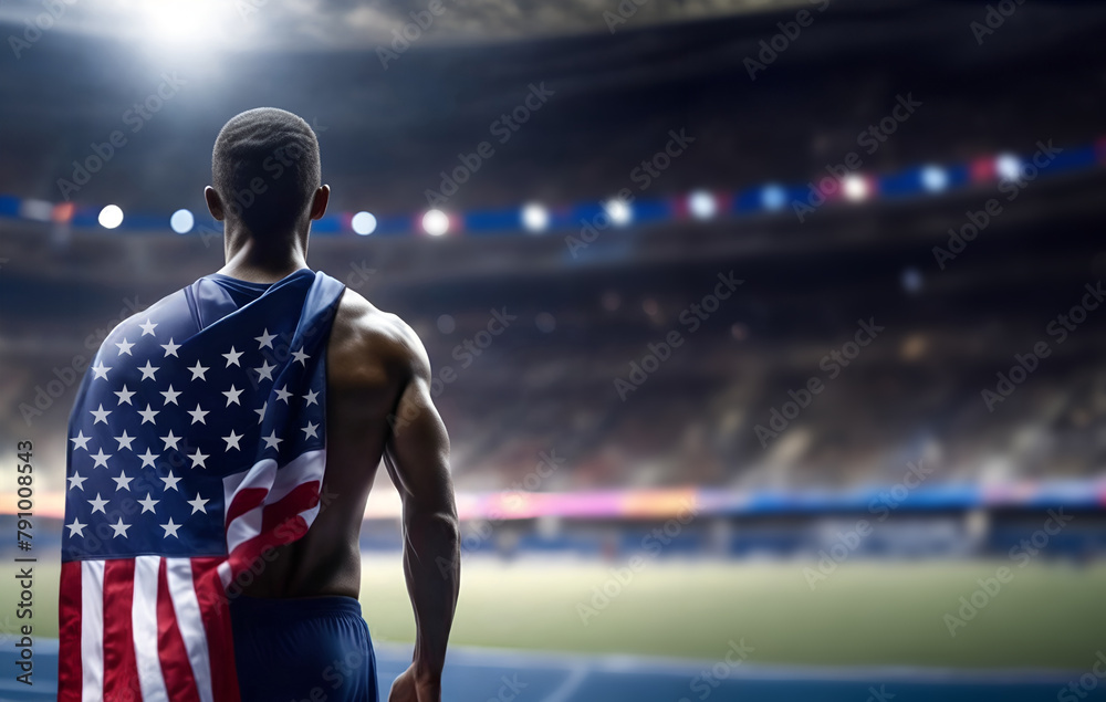 Triumphant USA olympic track athlete draped in the american flag ...