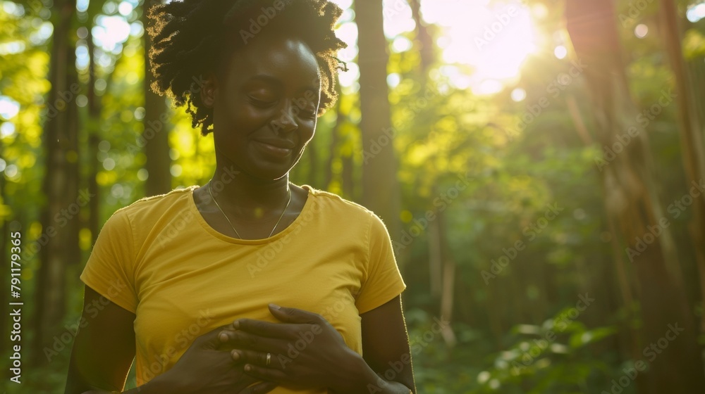 A person holding their stomach with a relieved expression conveying the ...