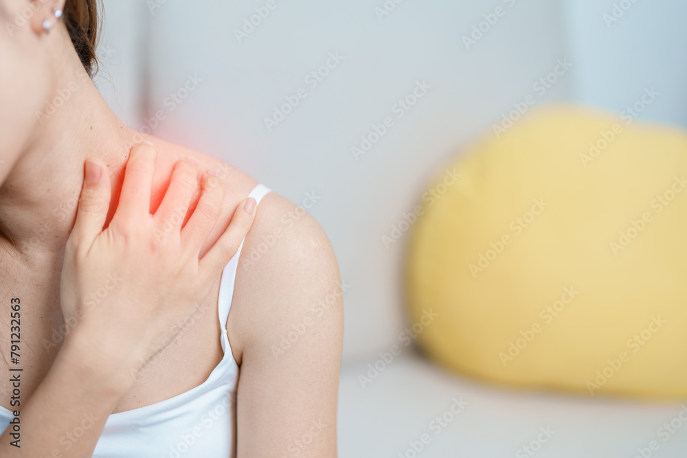 Woman having Shoulder and Neck pain at home. Muscle painful due to ...