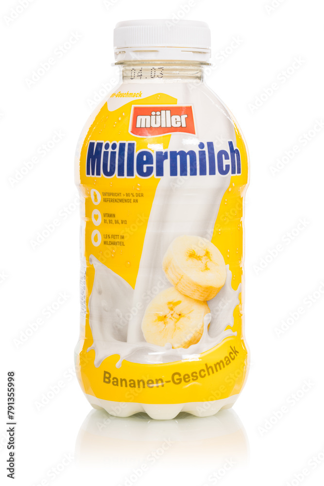 Müllermilch banana flavor in a bottle by Theo Müller company isolated ...