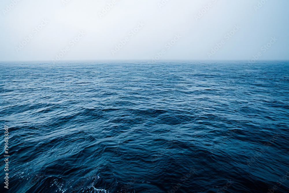 The vastness of the ocean stretching out to the horizon, with just the ...