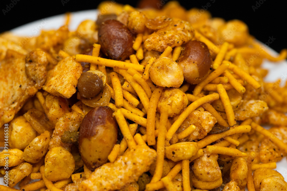 Hot spicy NavRatan mixture snacks in full-frame, made with, potato ...