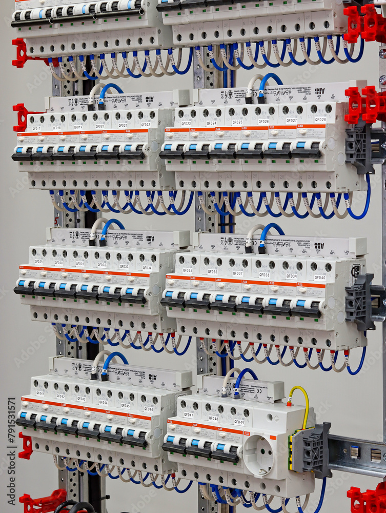 An electric switchboard with modules for protection and control of ...