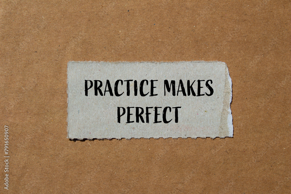 Practice makes perfect words written on ripped paper with brown ...