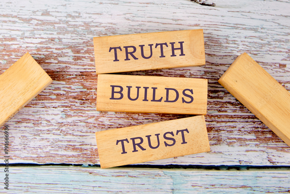 Truth builds trust symbol. Concept words Truth builds trust on wooden ...