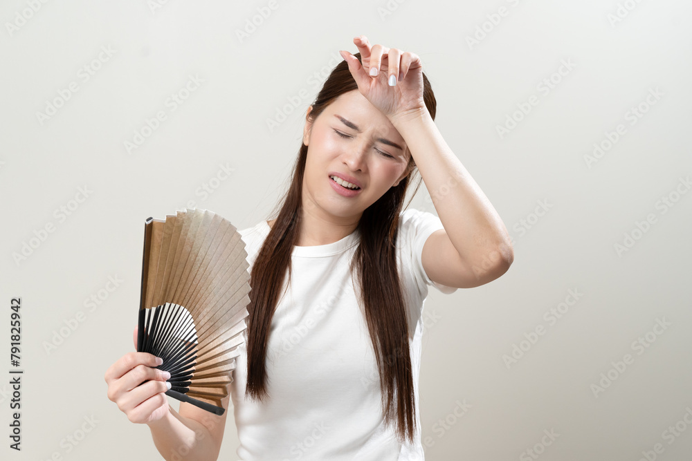 Suffering summer heat wave stroke, hot weather, tired asian young woman ...