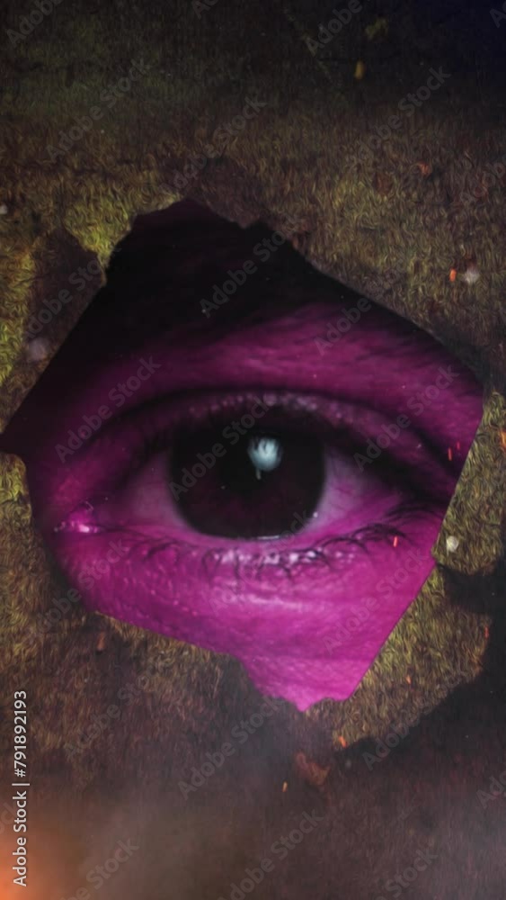 Vertical Purple Eye Looking Through Hole with Smoke 4K Loop features an ...