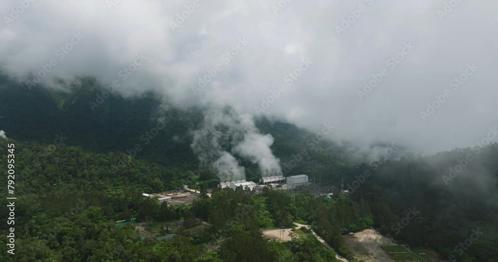 Drone view of Geothermal Production Field with steam and pipes ...