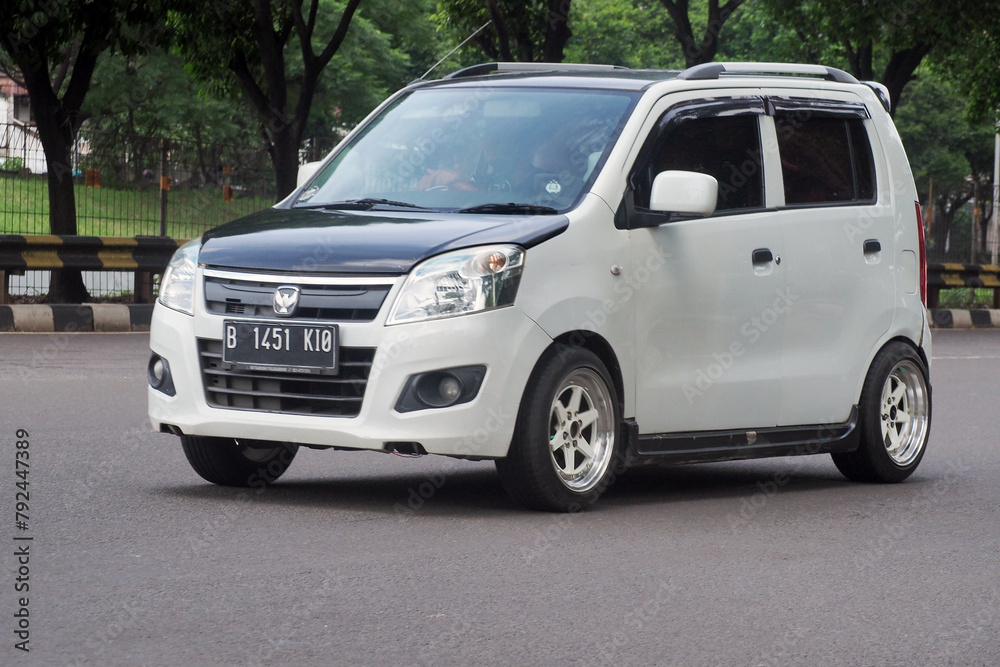 Compact City car, LCGC (low cost green ca). white Suzuki Wagon R with ...