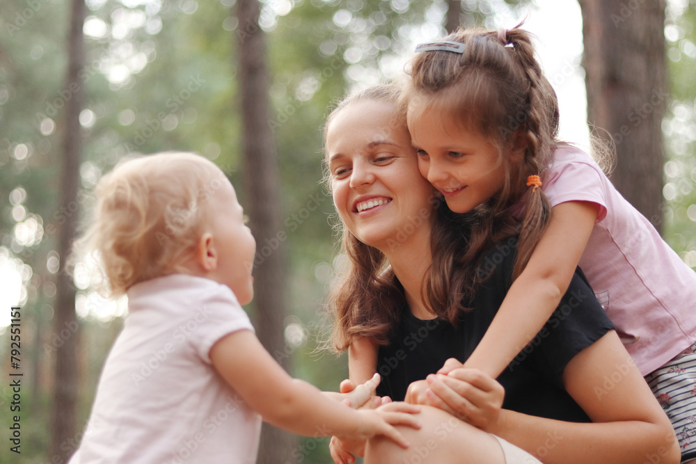 Kids congratulating mommy with mother's day. Happy Caucasian family ...
