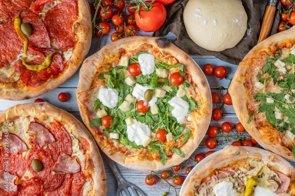 Table Full of Pizza: A tempting display of various pizzas spread across ...