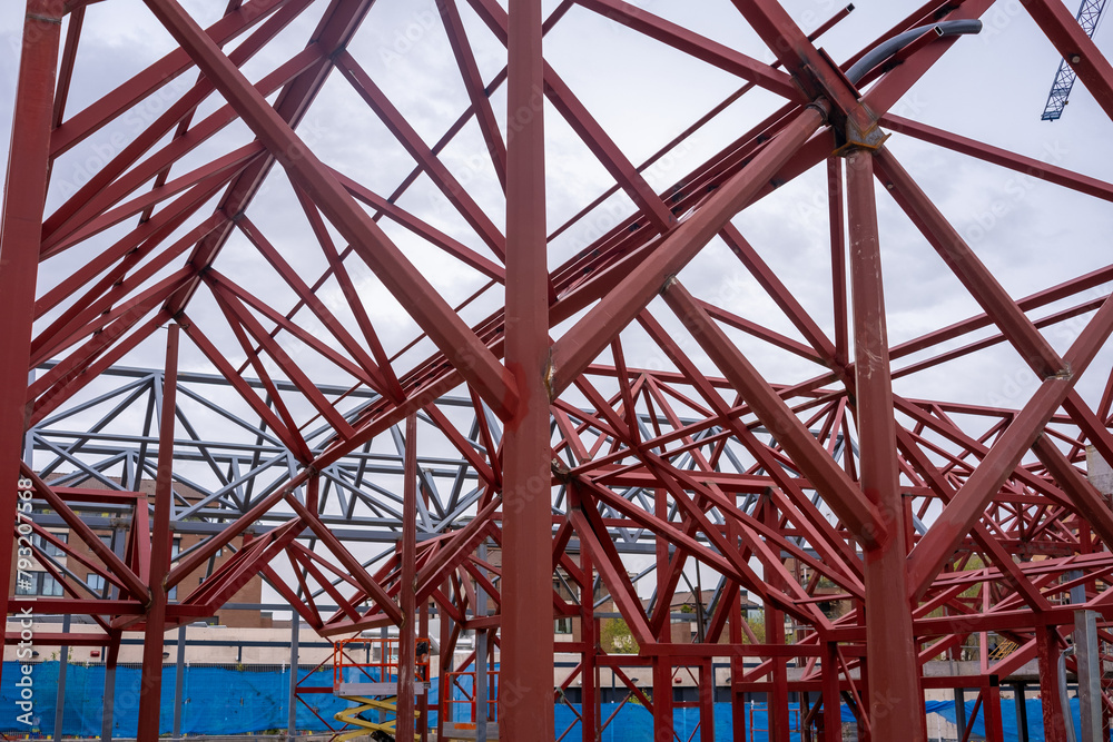 Complex network of red beams forming a light and geometric structure ...