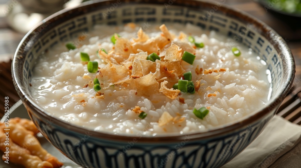 Gourmet close-up of Chinese rice porridge in a deep bowl, creamy ...