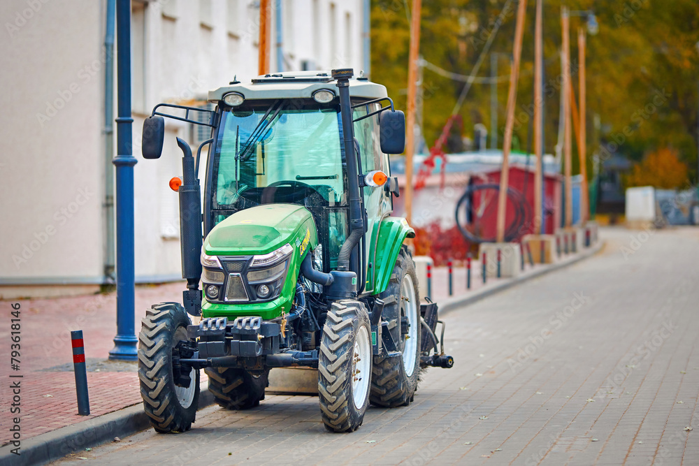 Minsk, Belarus. Oct 16, 2022. Small tractor CATMANN with sweeper brush ...
