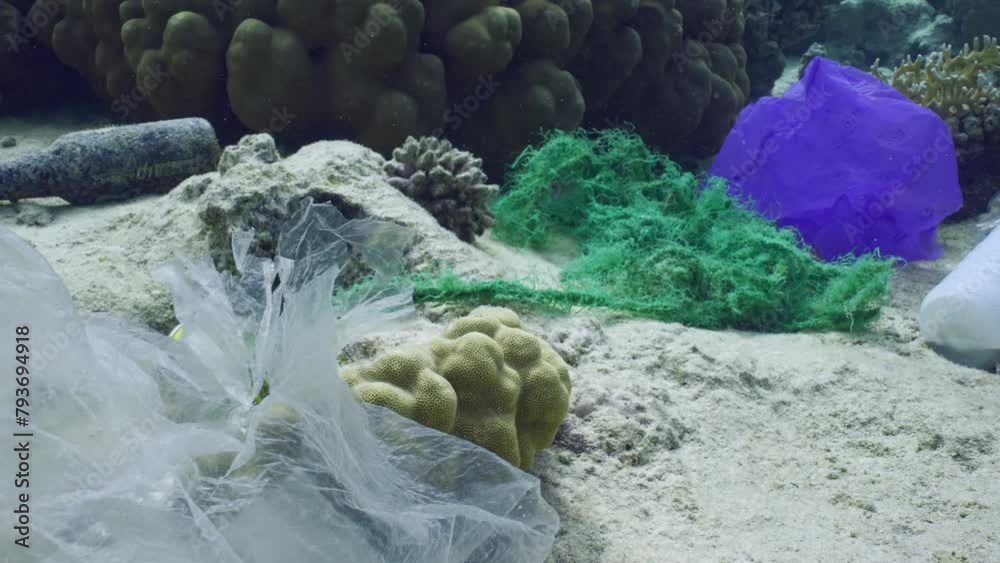 Plastic pollution of beautiful shallow coral reef, Slow motion ...