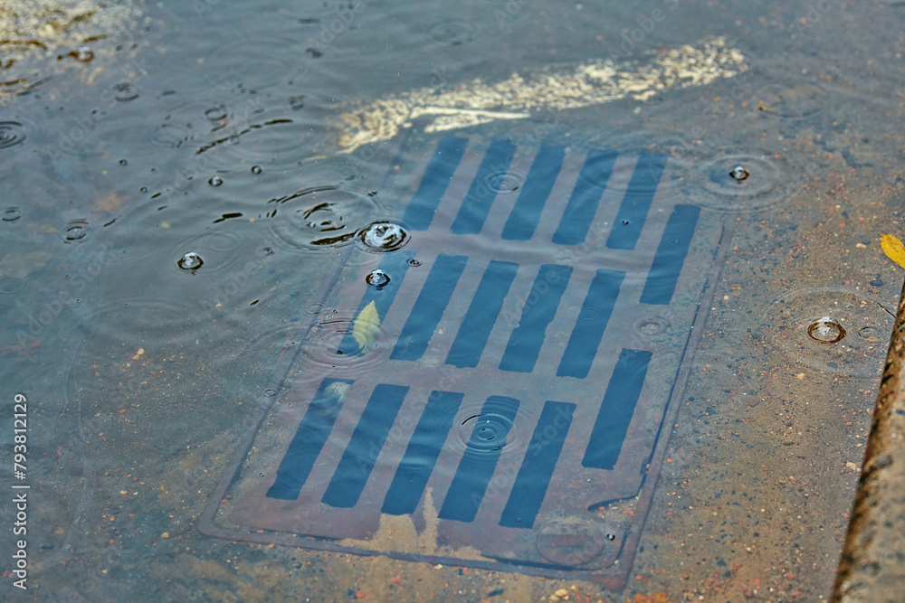 Flooded sewer drain hole, clogged drains. Blocked drainage system ...
