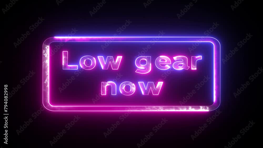 Vidéo Stock Neon triangular road caution sign with low gear now sign ...