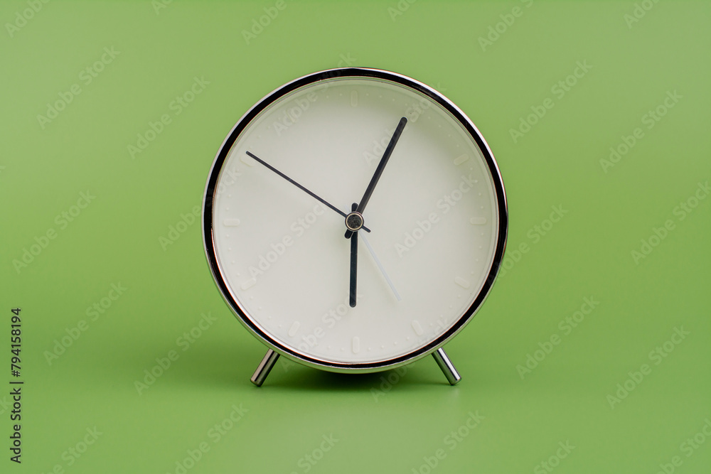 Time, standing still, time hand, photo of a moving clock on a green ...