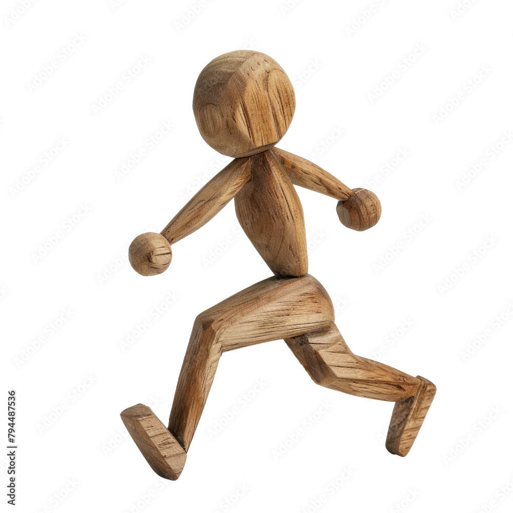 A wooden figurine appears to be in a running pose captured from the ...